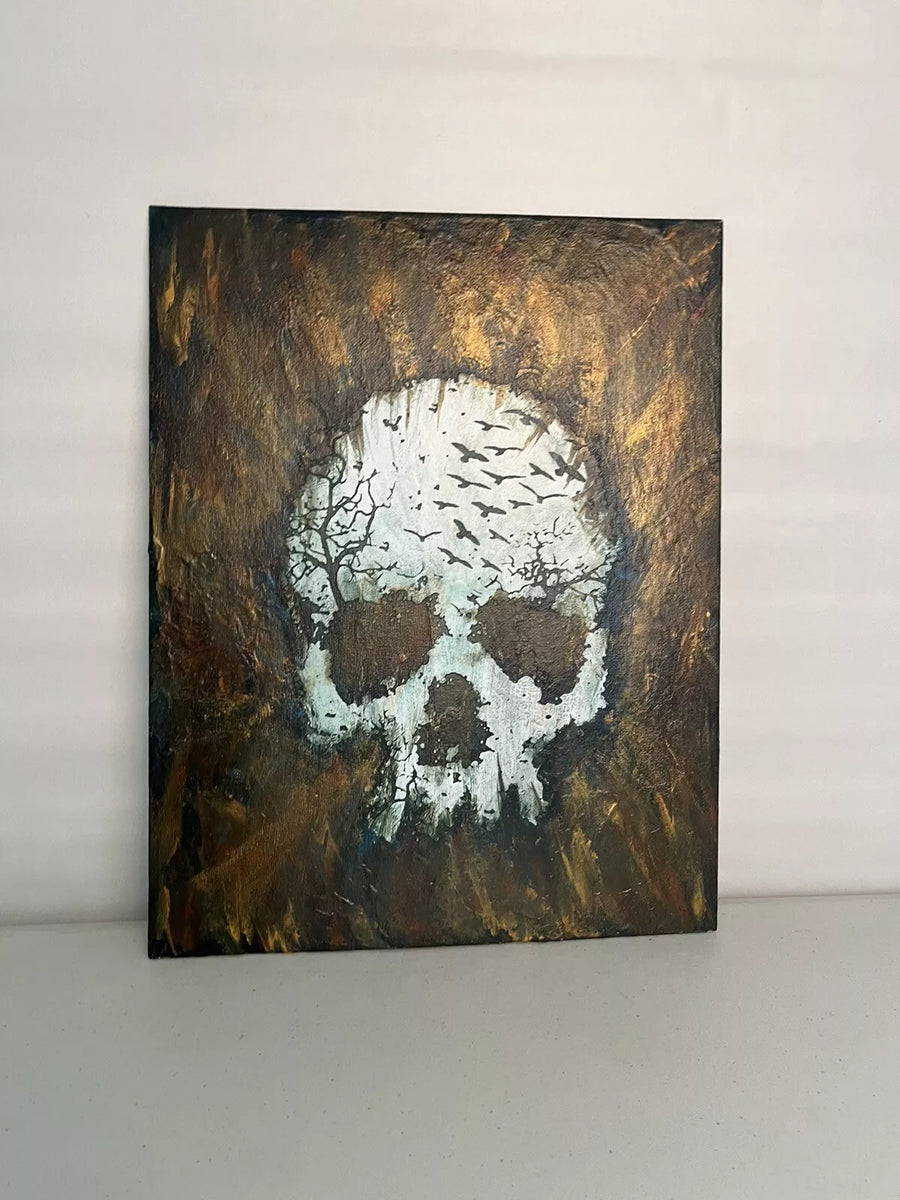 Acrylic on canvas white skeleton head in black and gold color backgrou ...